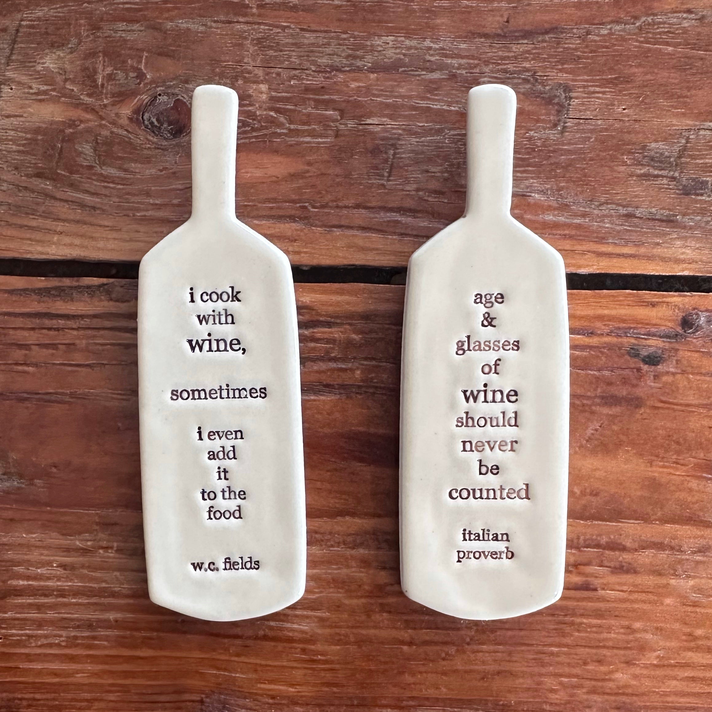 ceramic wine bottle magnets – paper boat press