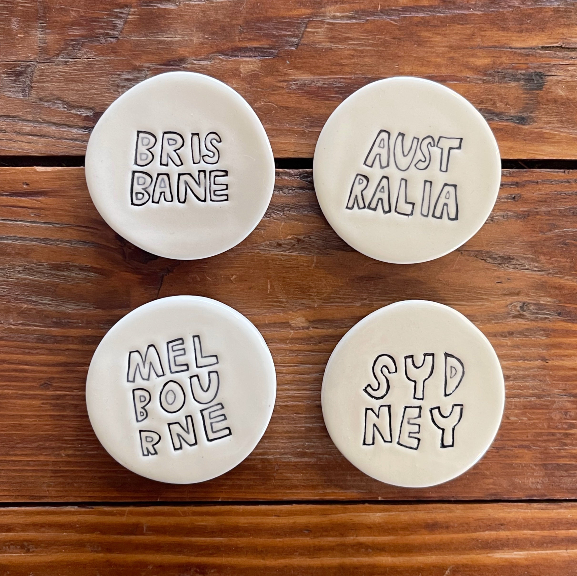 bris x syd x melb x aust round magnet – paper boat press